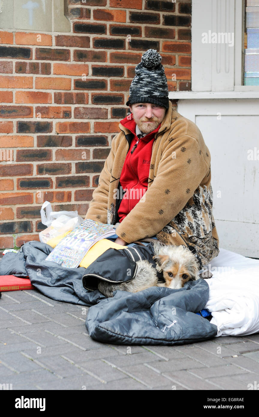 Big Issue Seller And His Dog Stock Photo - Alamy