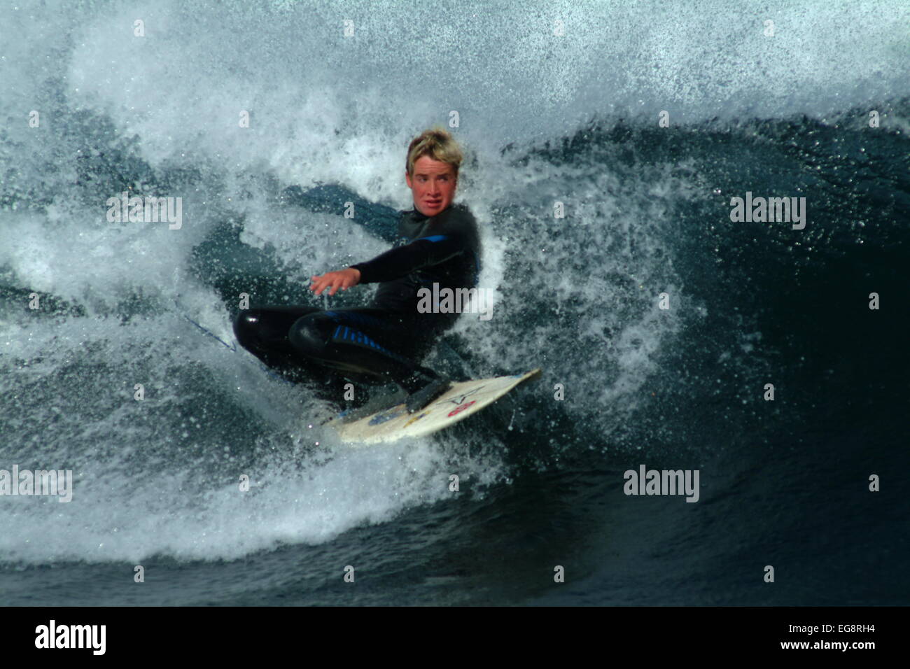 a laid back stall positions this surfer in the hollowest part of a ...