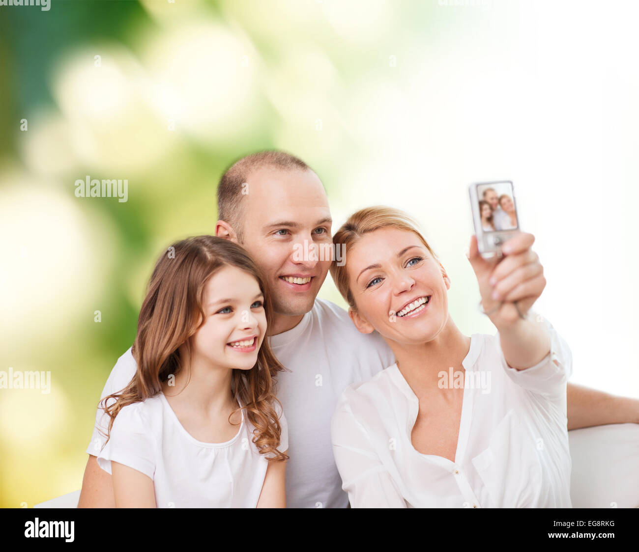happy family with camera at home Stock Photo - Alamy