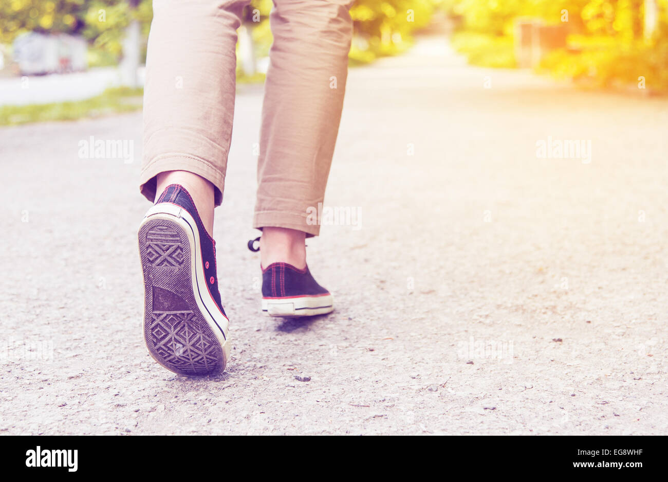 walking woman health running country cross legs Stock Photo - Alamy