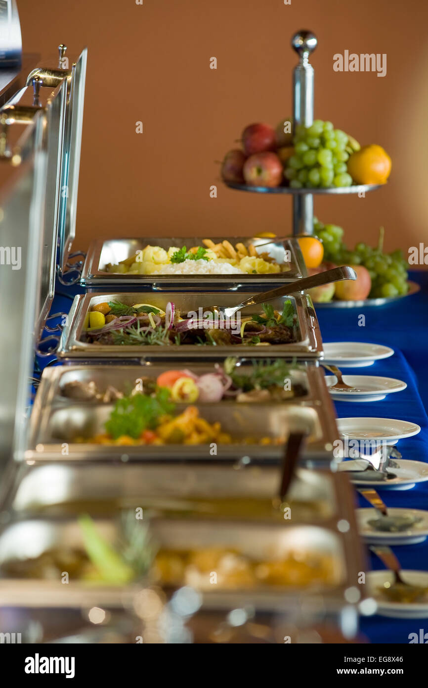 Banquet meals and Metallic banquet meal trays served on tables Stock ...