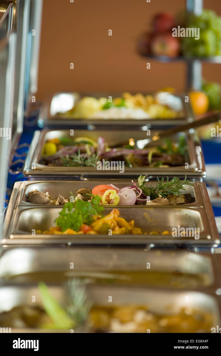 Banquet meals and Metallic banquet meal trays served on tables Stock ...