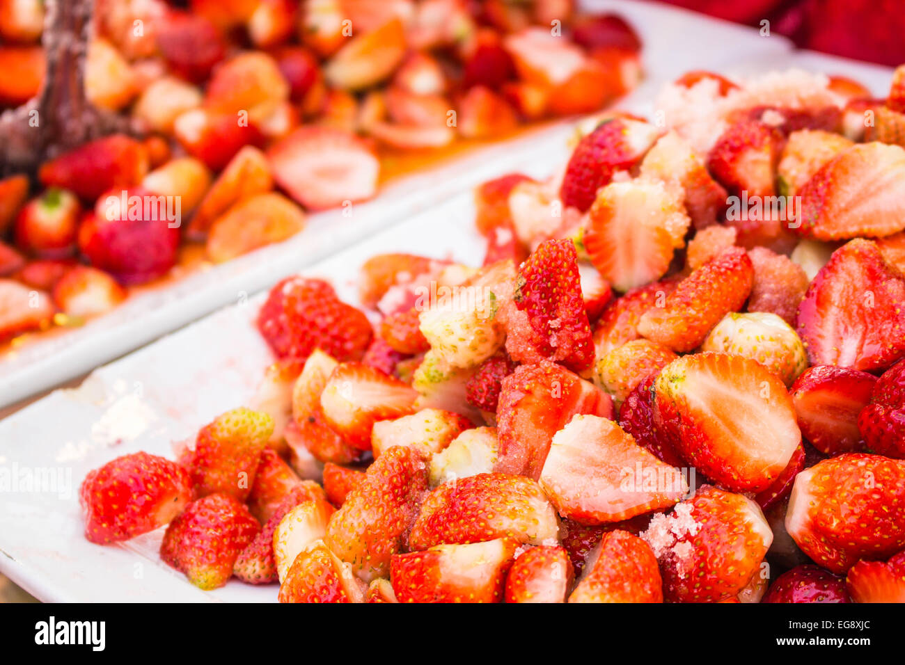 Strawberries mixed with salt in a tray Stock Photo - Alamy