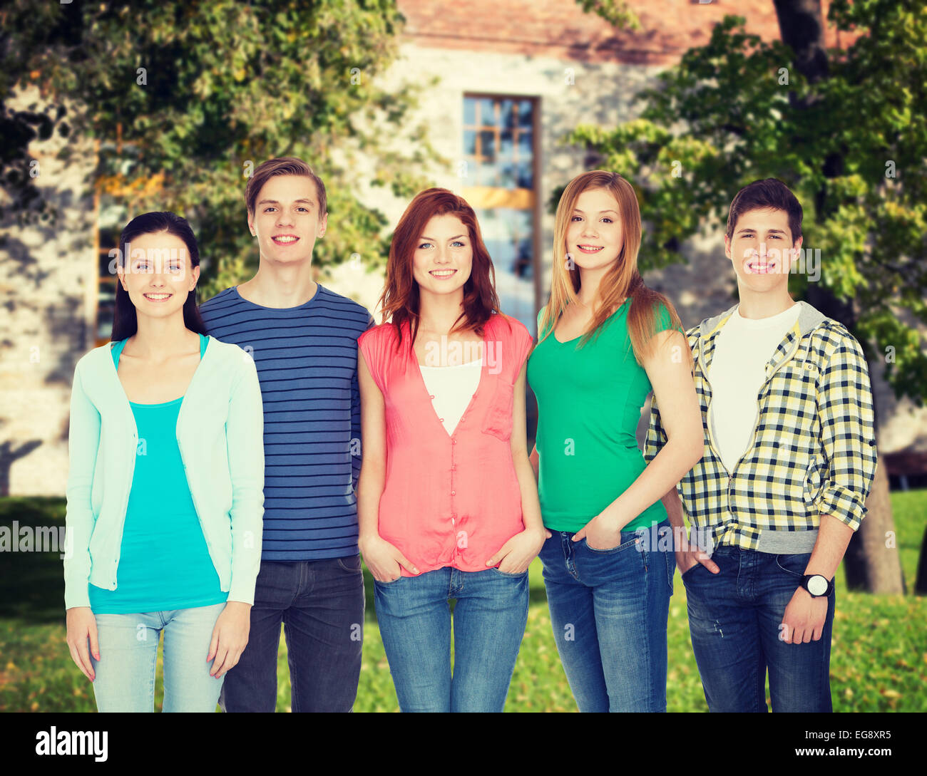group of smiling students standing Stock Photo - Alamy
