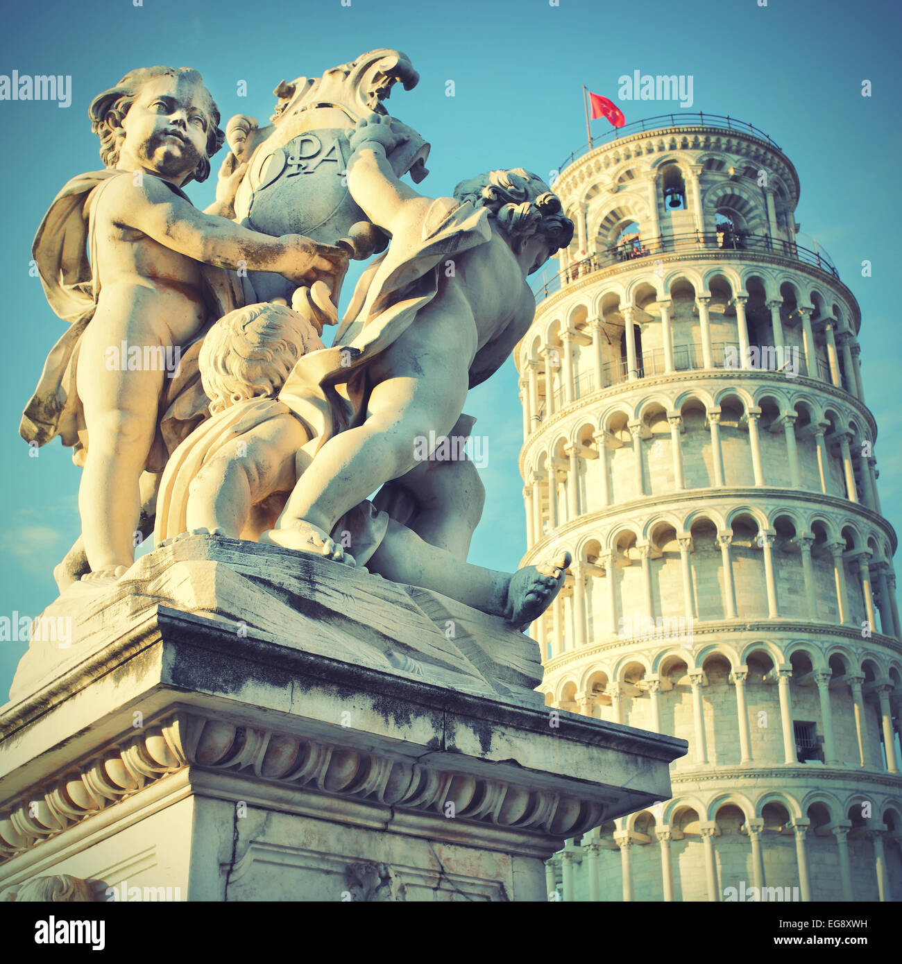Statue of angels on Square of Miracles in Pisa and Leaning Tower, Italy ...