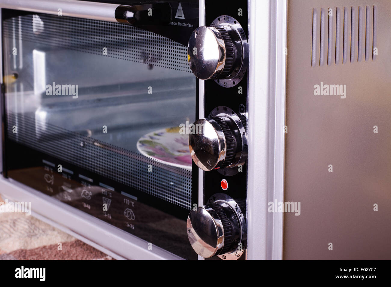 Gray Electric stove in the kitchen Stock Photo - Alamy