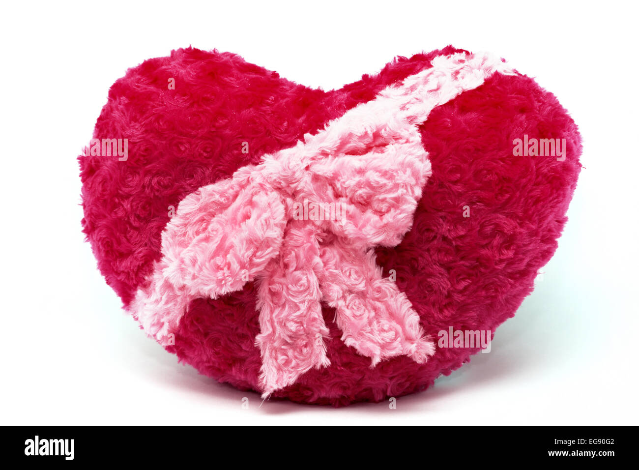 red stuffed heart isolated on white background Stock Photo - Alamy