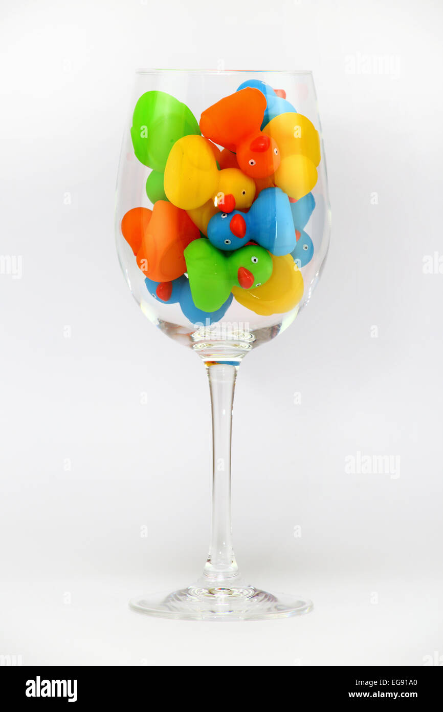 colorful flock of duckling in glass isolated on white background Stock ...