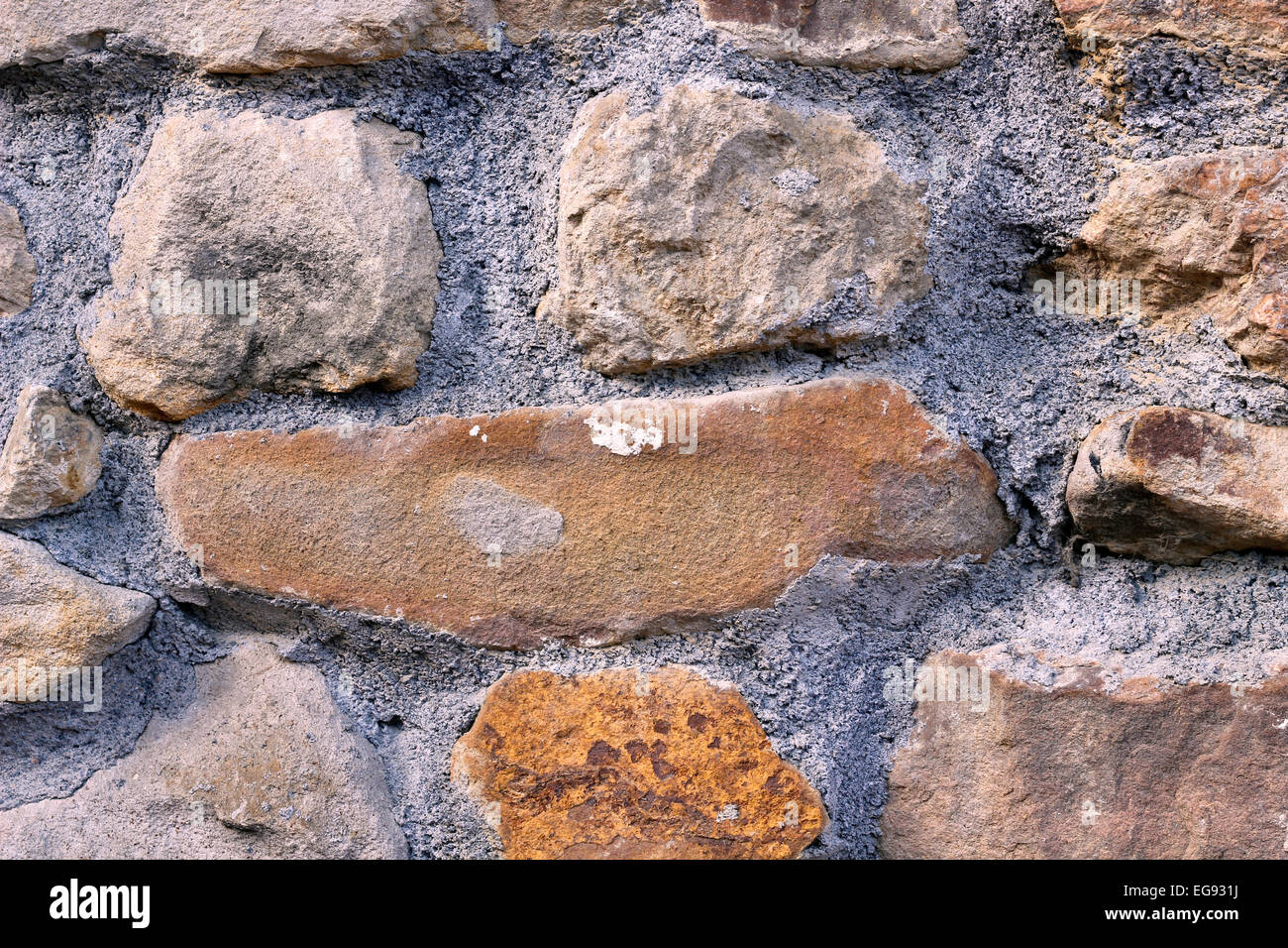 Stone wall material construction build house texture Stock Photo - Alamy