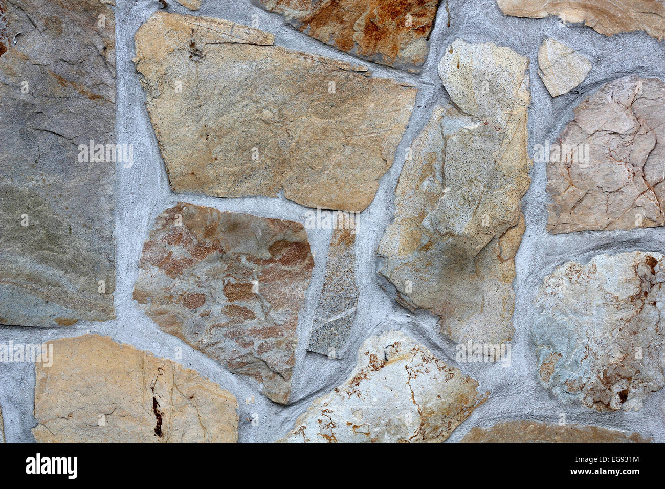 Stone wall material construction build house texture Stock Photo - Alamy