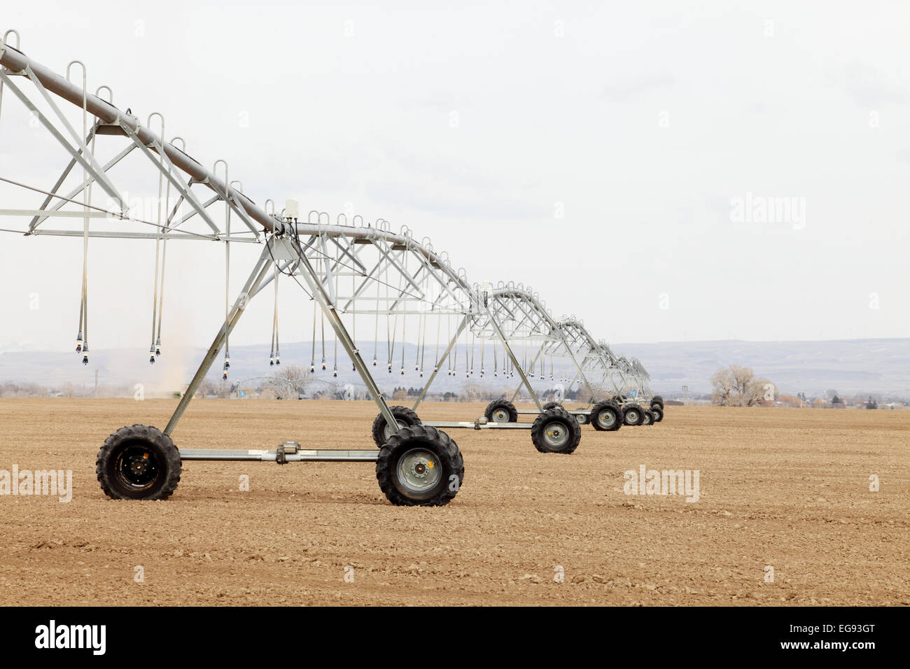 A newly installed center pivot sprinkler prepared for a new farming ...