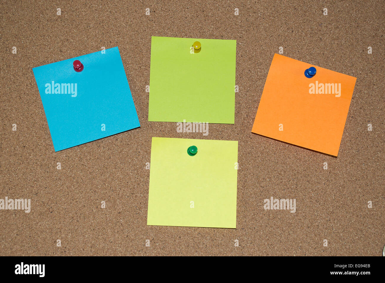 Multi Coloured Post it Notes on a Cork Board Stock Photo - Alamy