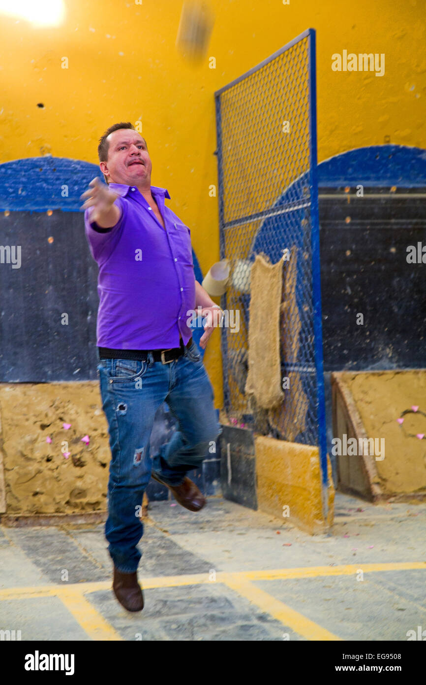Man playing tejo, the national sport of Colombia Stock Photo - Alamy