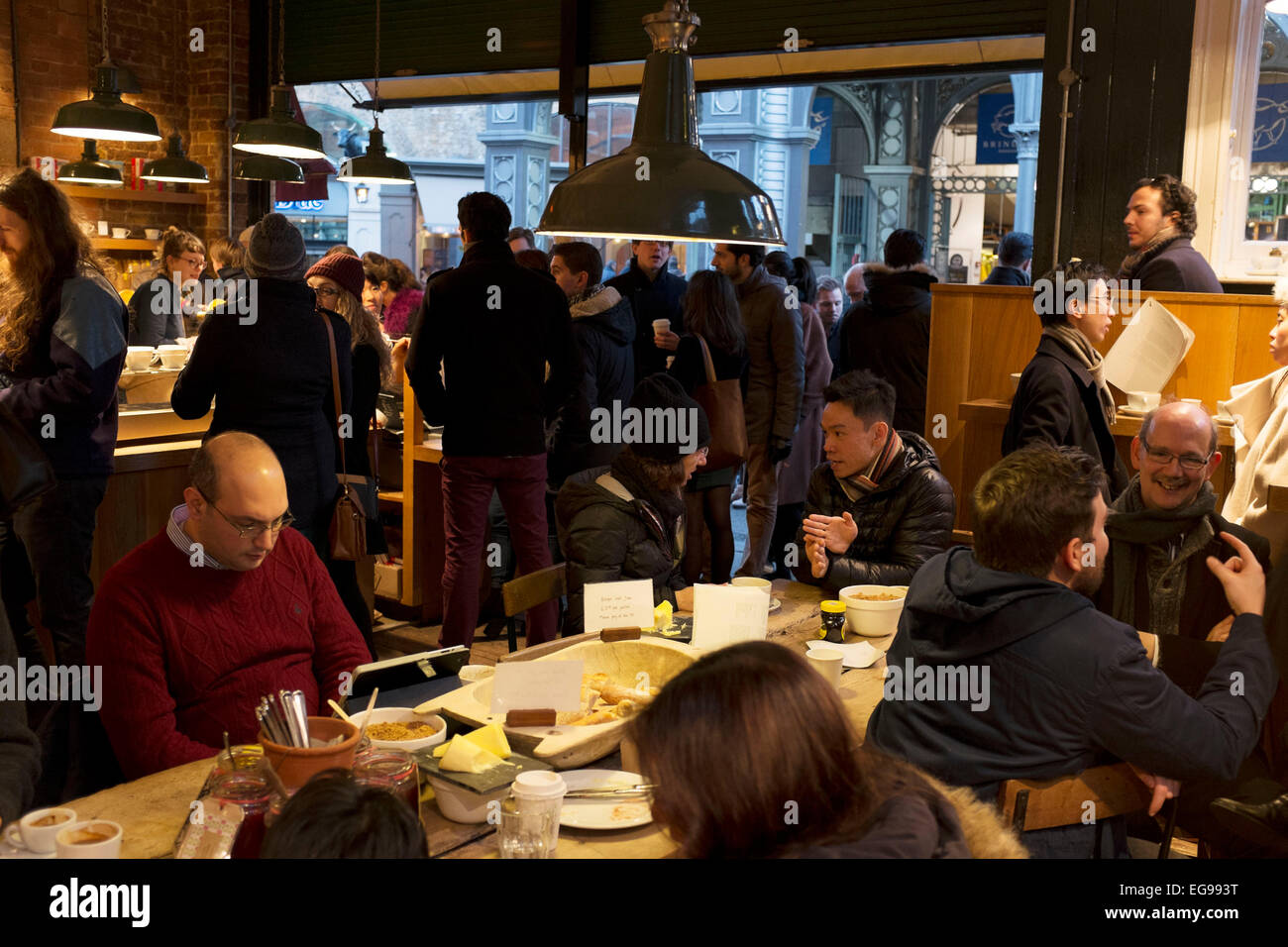 People chatting away at Monmouth Coffee at Borough Market, London, UK ...