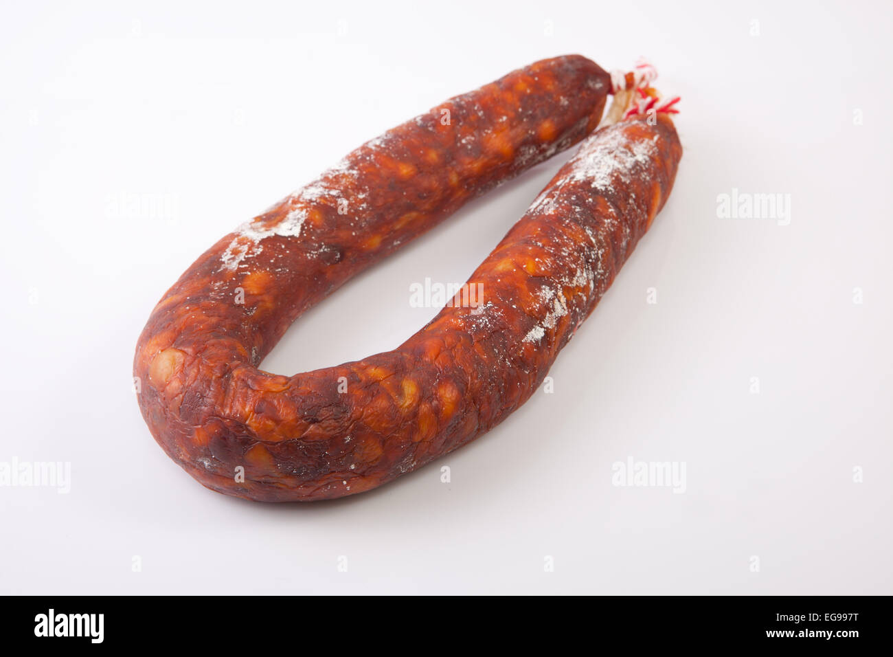 Red spanish chorizo sausage. Isolated over white background Stock Photo ...