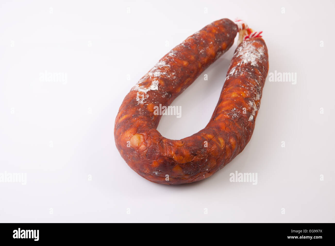 Red spanish chorizo sausage. Isolated over white background Stock Photo ...