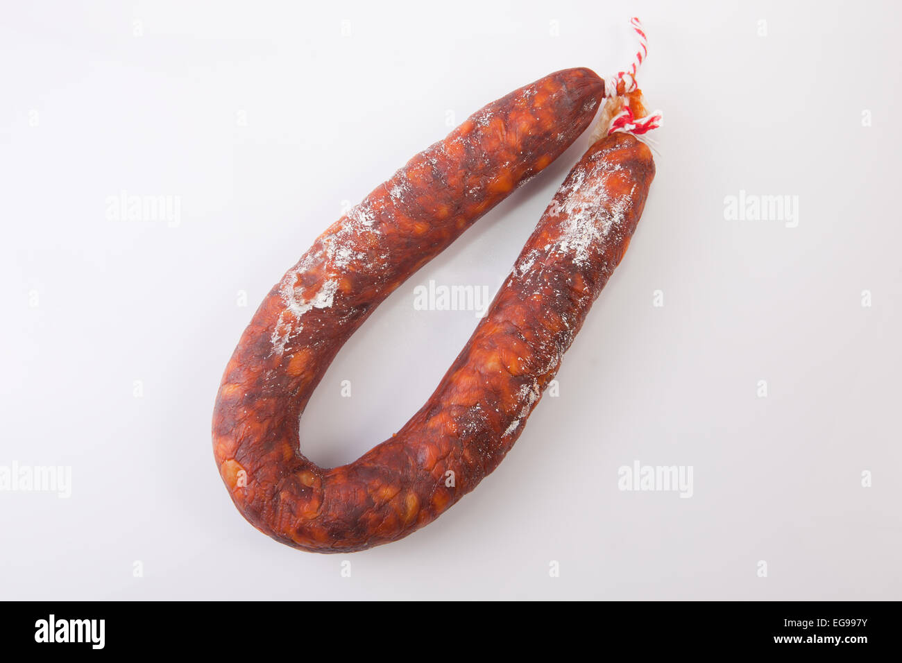 Red spanish chorizo sausage. Isolated over white background Stock Photo ...