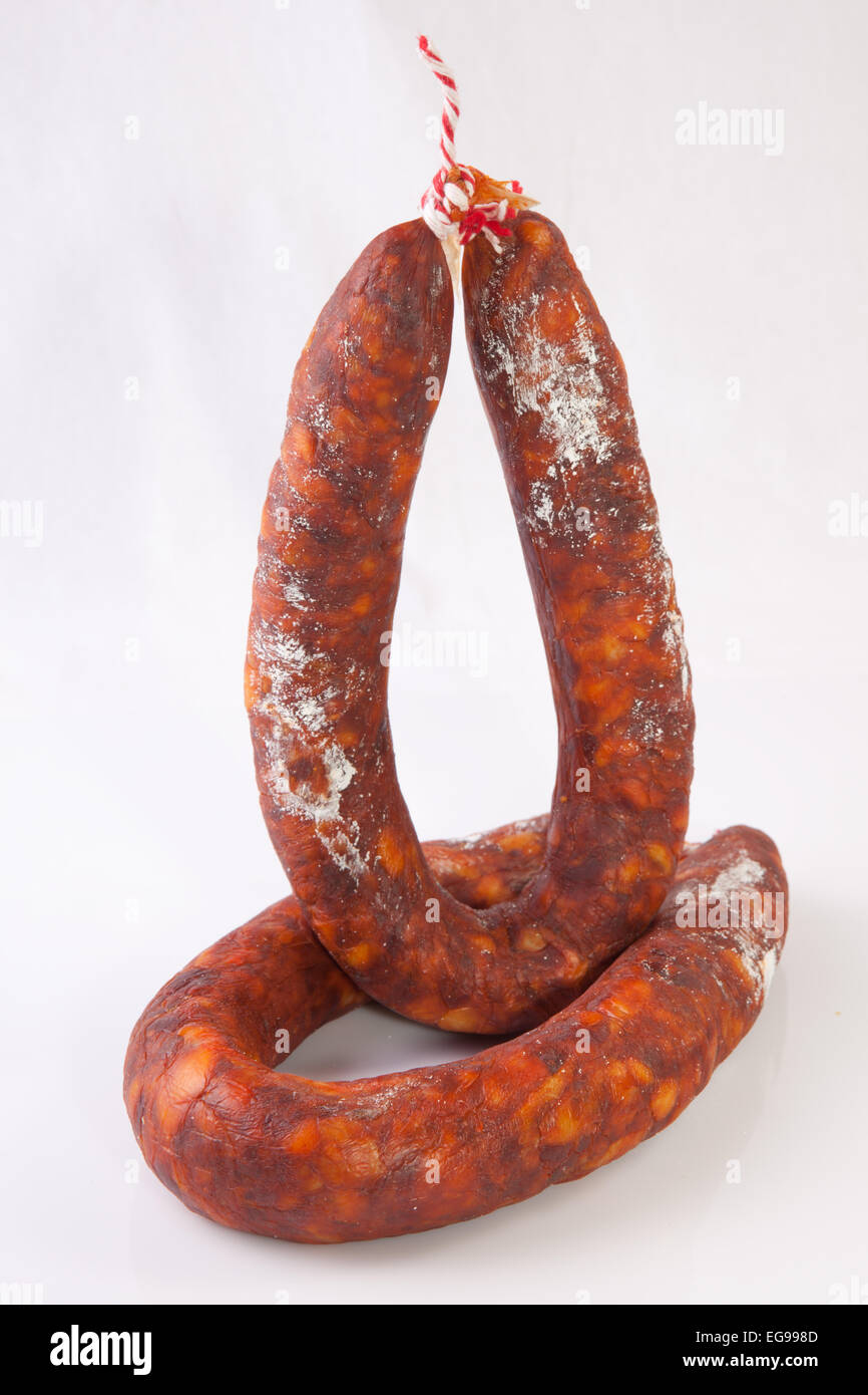 Two red spanish chorizos. Isolated over white background Stock Photo ...