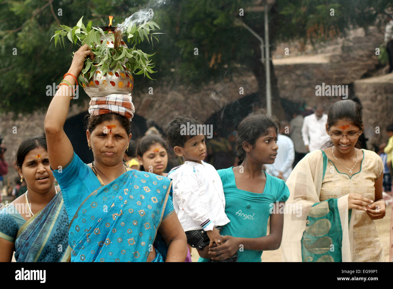 Indian women carry bonam during Bonalu a hindu festival near temple in ...