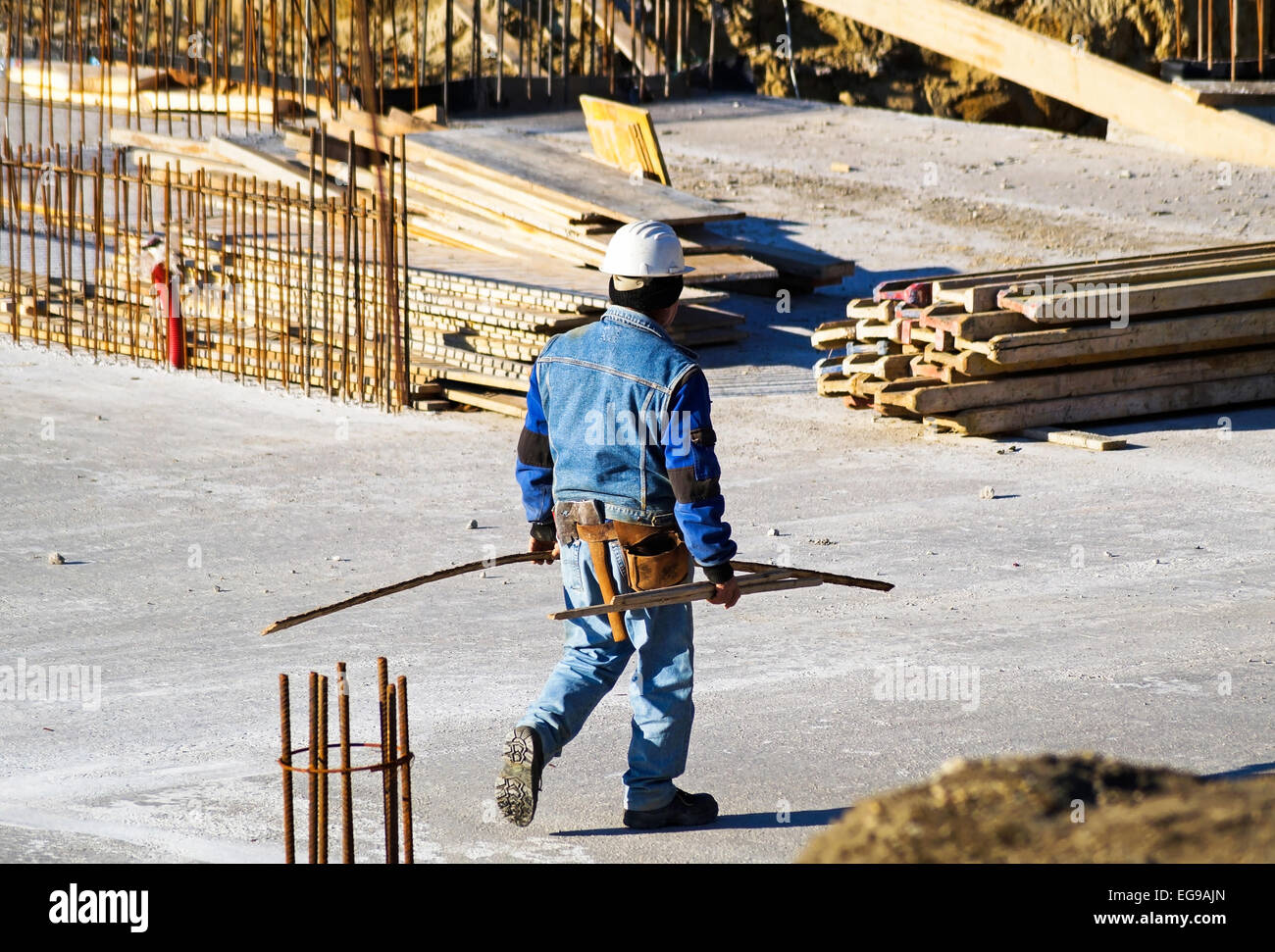 Man is working at the construction site Stock Photo - Alamy