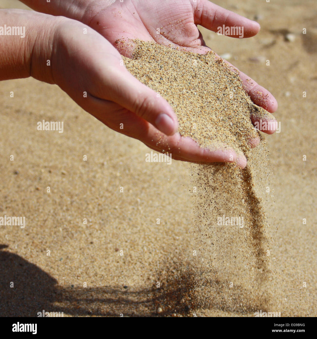 Warm sand pleasant to the touch Stock Photo - Alamy