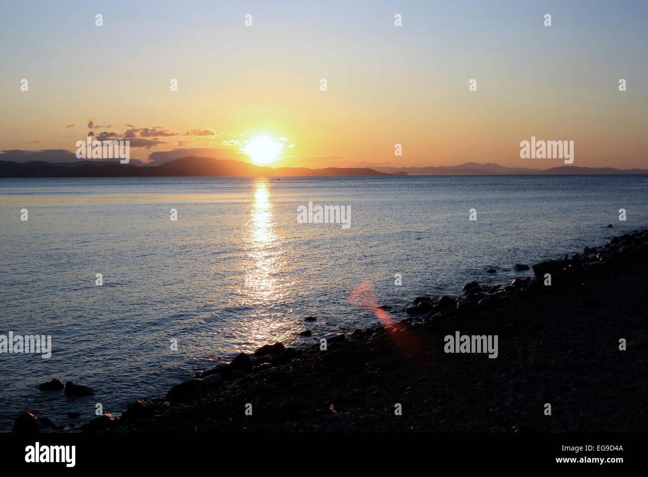 The rising sun glow has painted all in a circle Stock Photo - Alamy