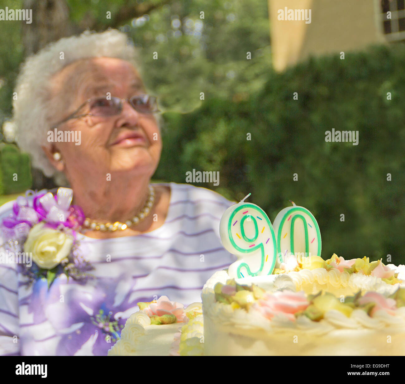Senior woman with birthday cake Stock Photo - Alamy