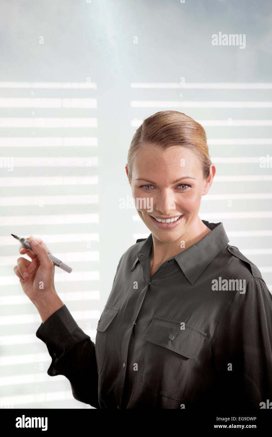 Female businesswoman giving presentation Stock Photo - Alamy
