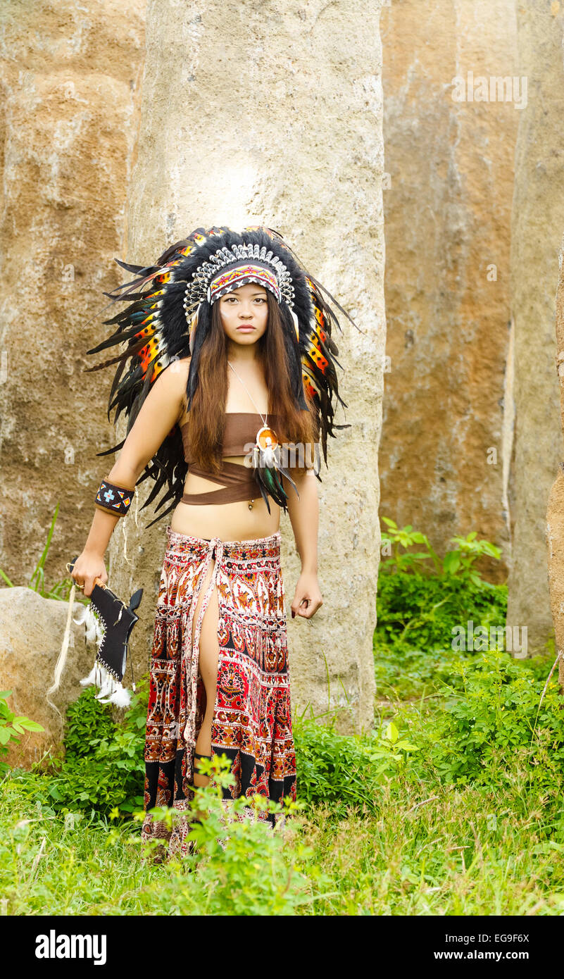 Native american, Indians in traditional dress, standing to the stone ...