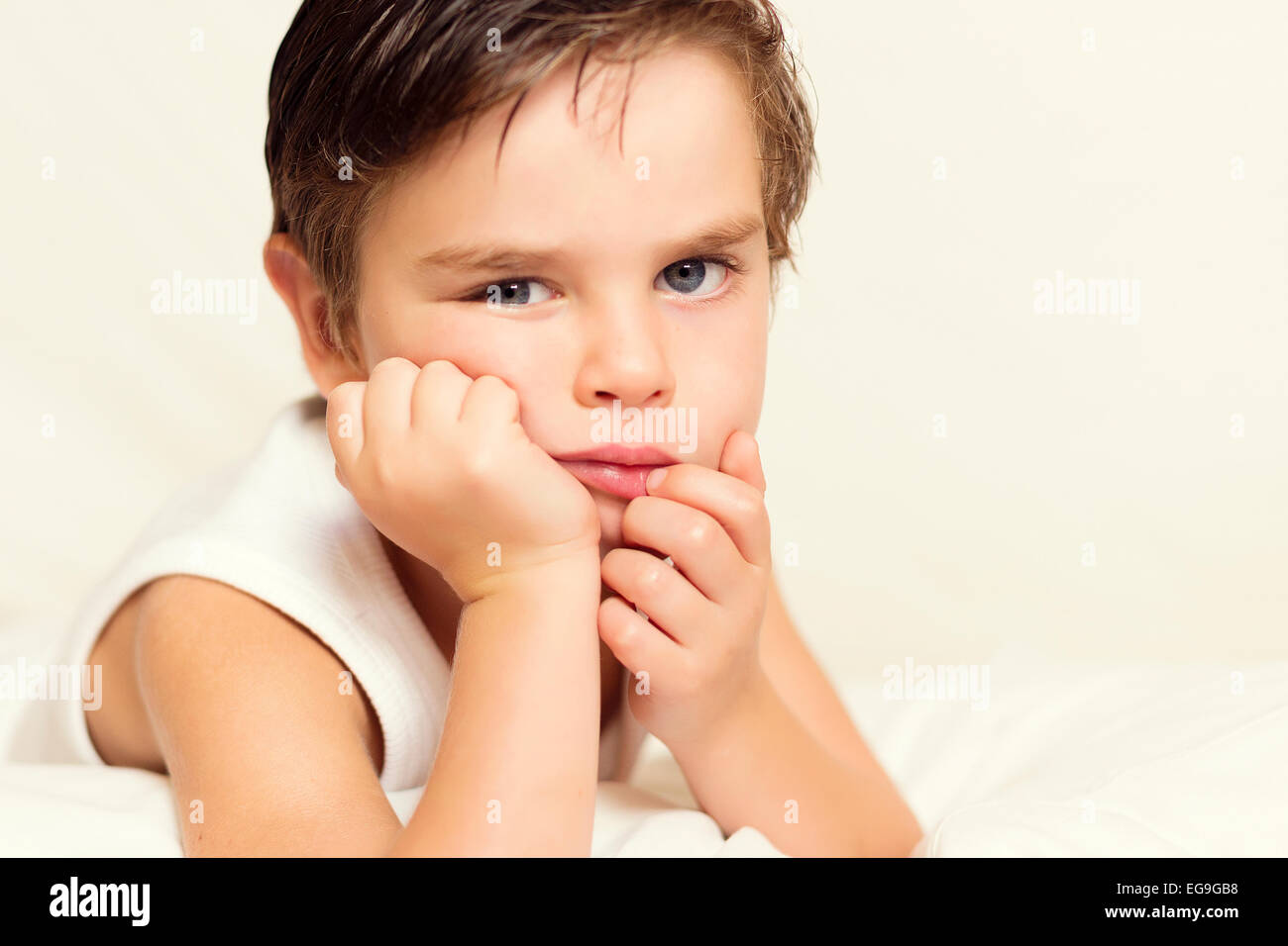 Child hand on chin hi-res stock photography and images - Alamy