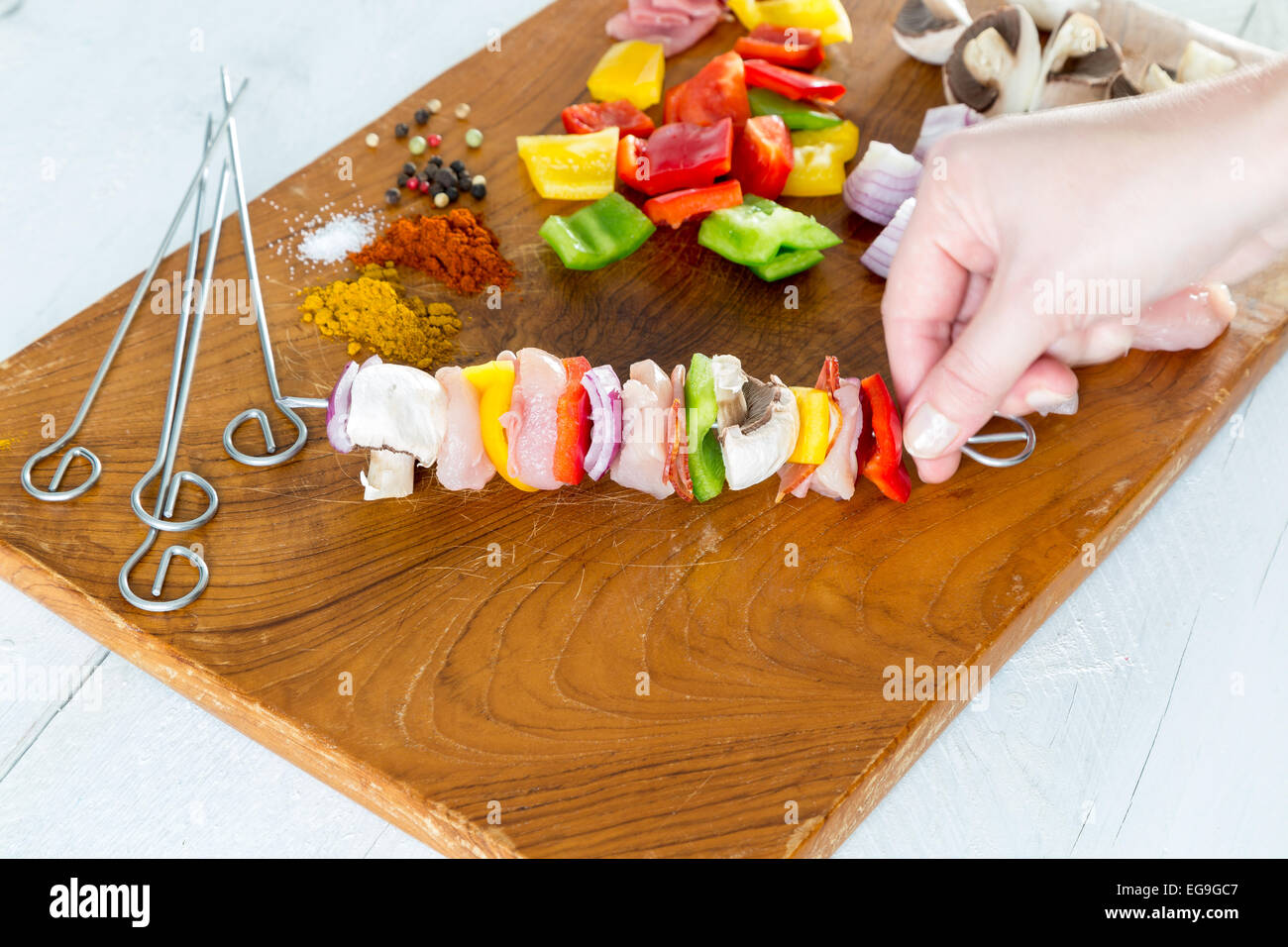 Ingredients for chicken skewers on a wooden board Stock Photo - Alamy
