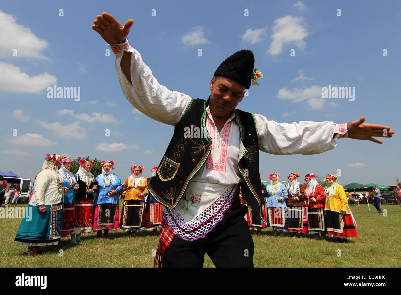 Bulgarian dancers wear traditional clothes during an annual folklore ...