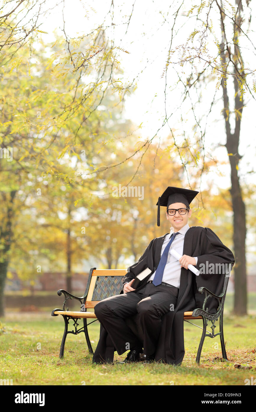 Happy graduate student diploma sitting hi-res stock photography and ...