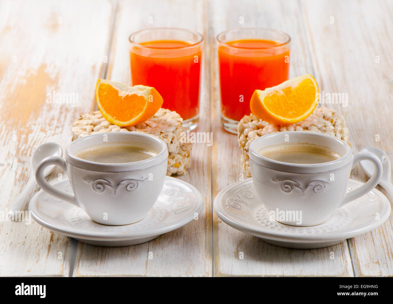 Healthy breakfast with two coffee cup on a white wood table Stock Photo ...