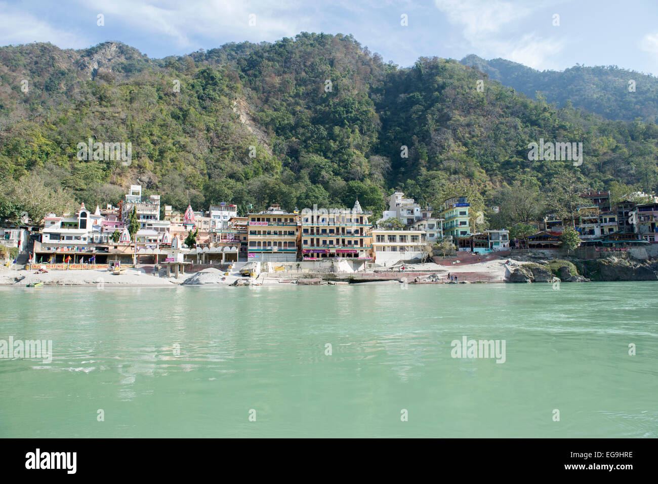 The buildings of Rishikesh which line the river Ganges or Ganga near ...