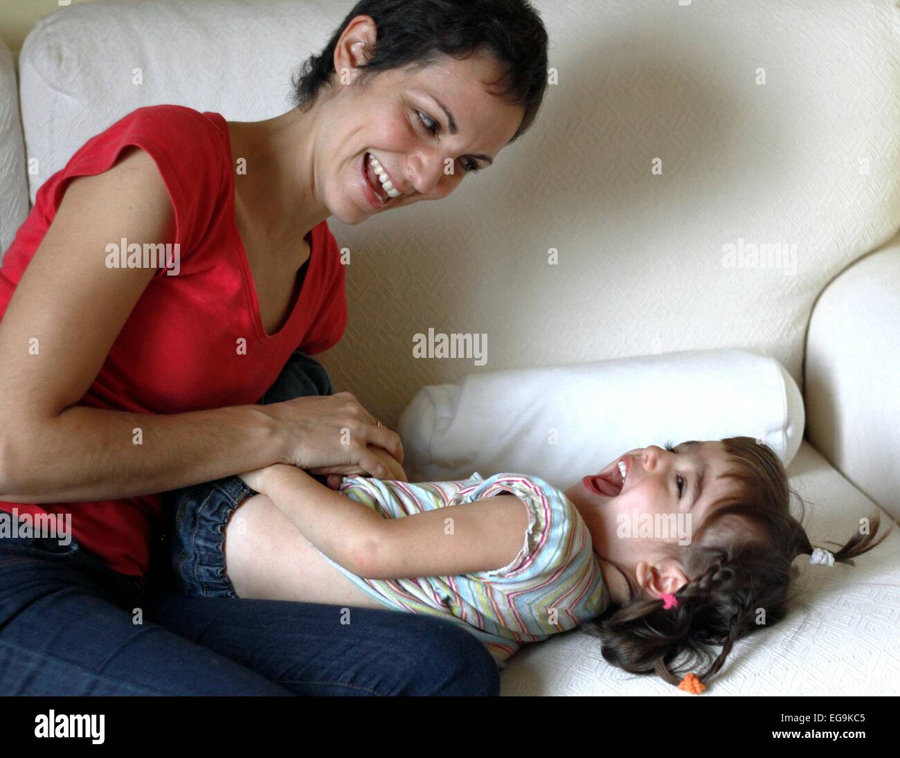 Mother sitting hi-res stock photography and images - Alamy