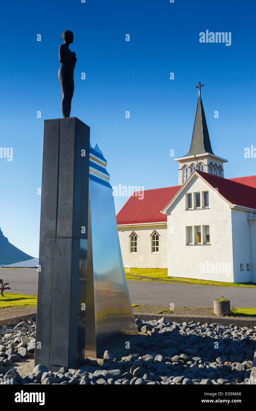 Church and statue in a village Stock Photo - Alamy