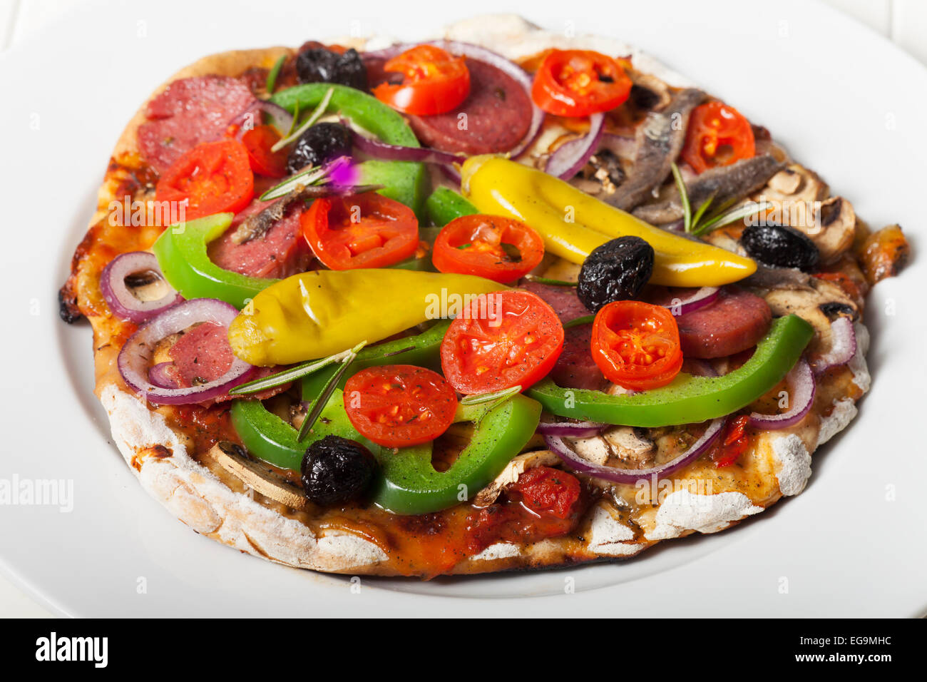 italian pizza with everything Stock Photo - Alamy