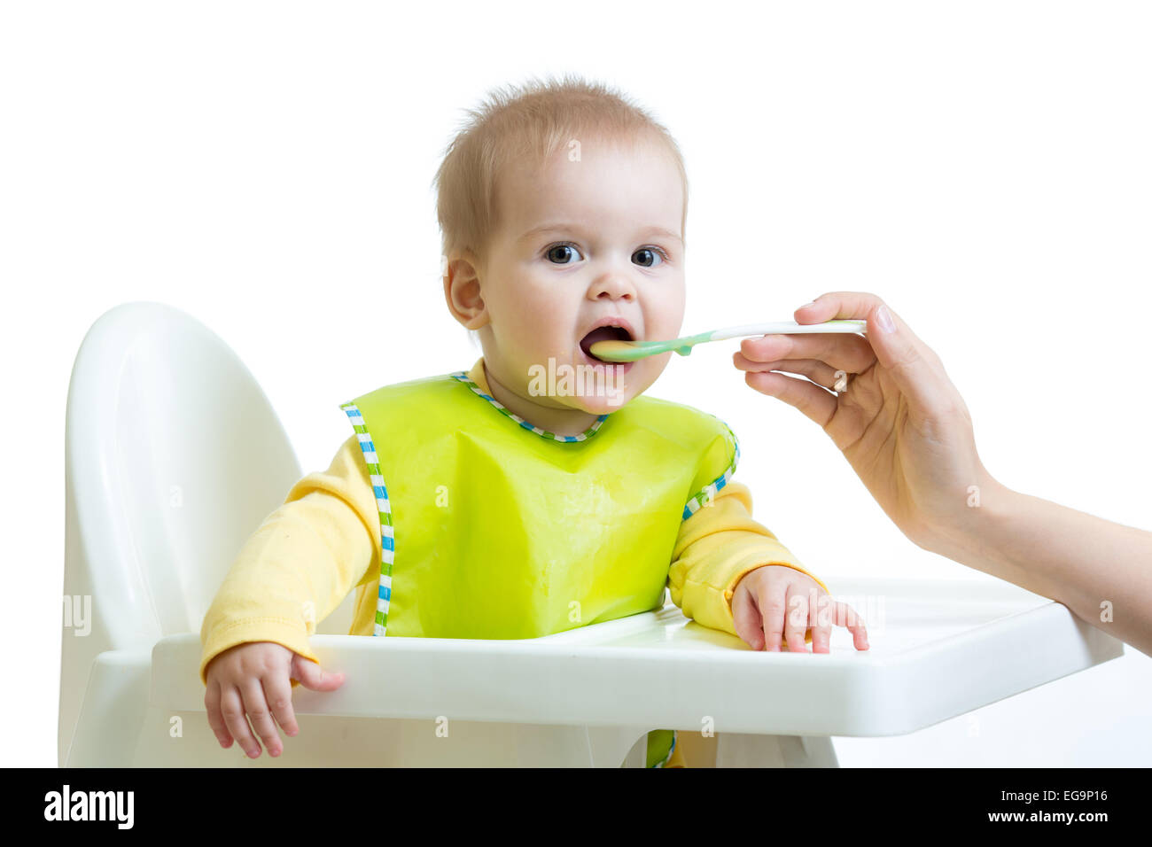 Mother feeding baby girl with puree hi-res stock photography and images ...