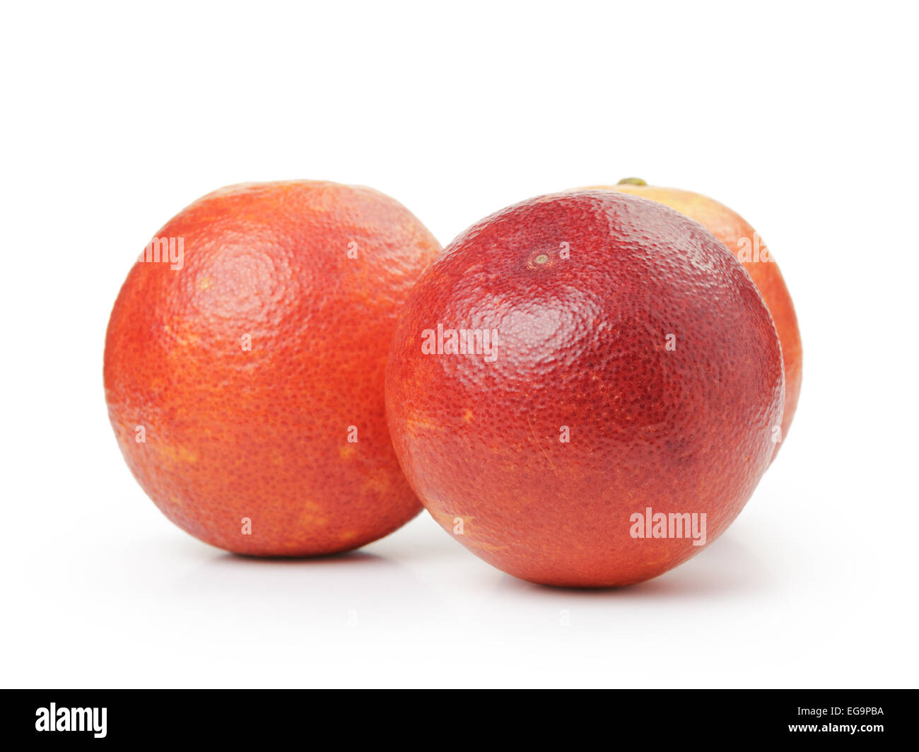 whole ripe blood red oranges isolated on white Stock Photo - Alamy