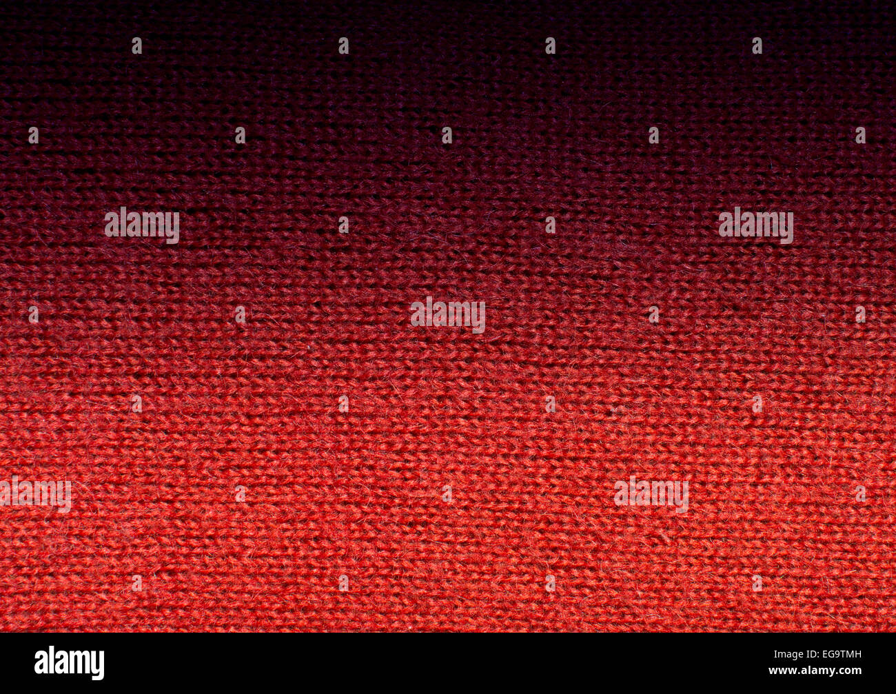 Red wool knitwork fade to black. Red wool knitwork full frame for ...