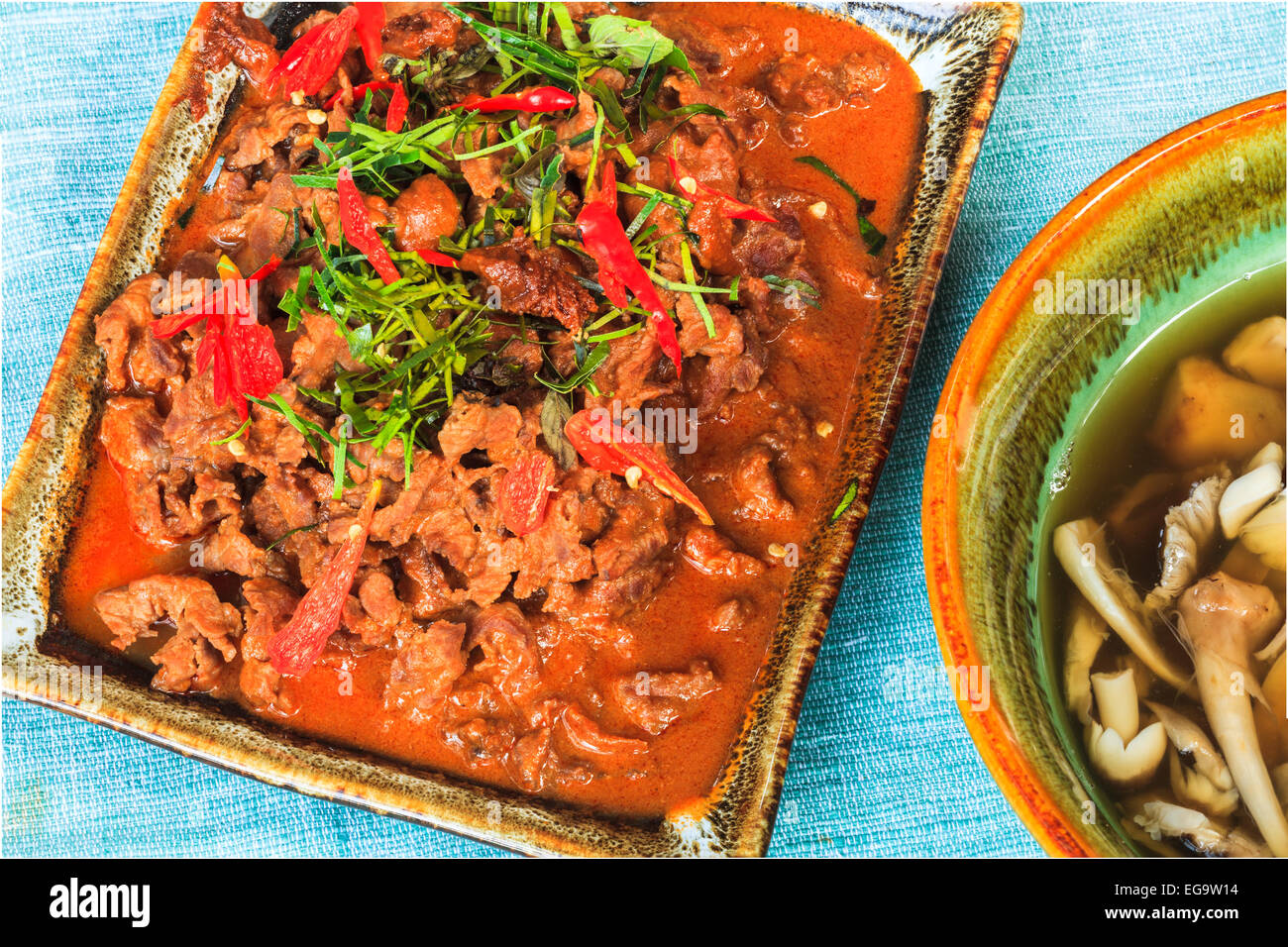 Thai style savory curry with beef on the plate Stock Photo - Alamy