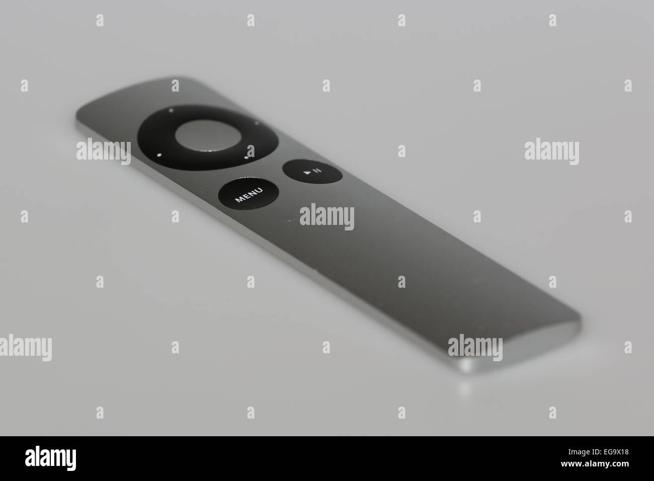 Apple TV universal remote control on a plain background Stock Photo - Alamy