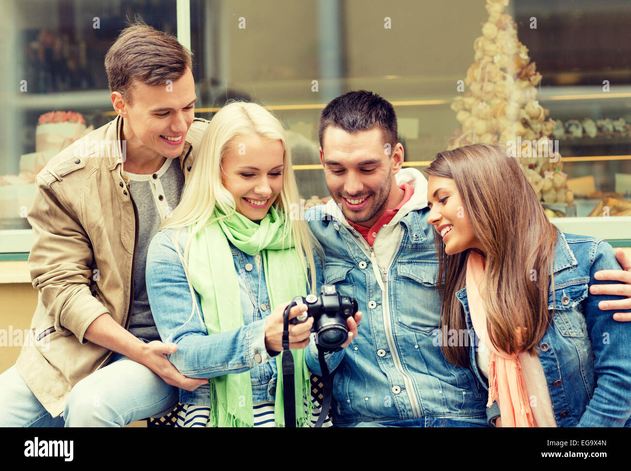 group of smiling friends with digital photocamera Stock Photo - Alamy