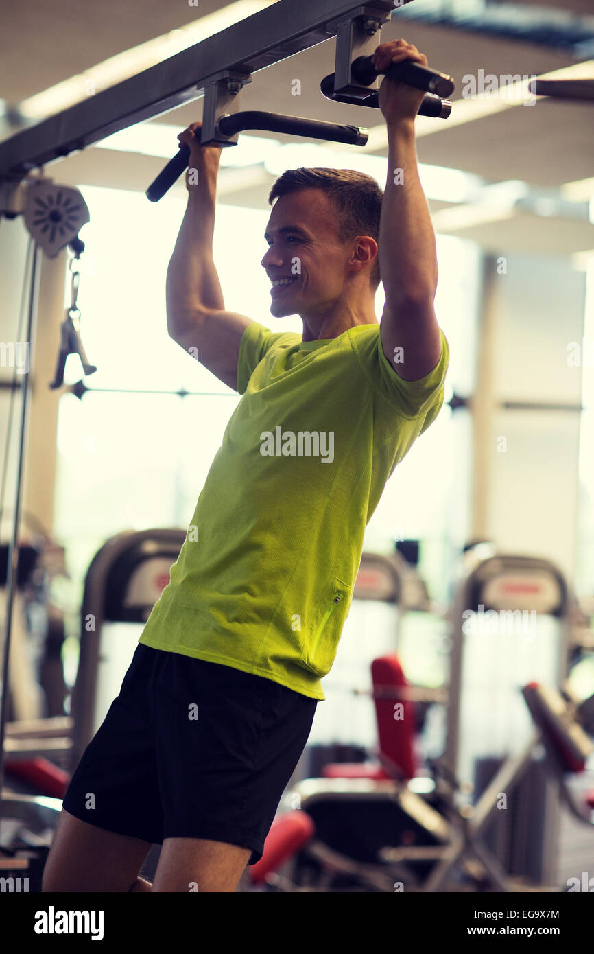 smiling man exercising in gym Stock Photo - Alamy