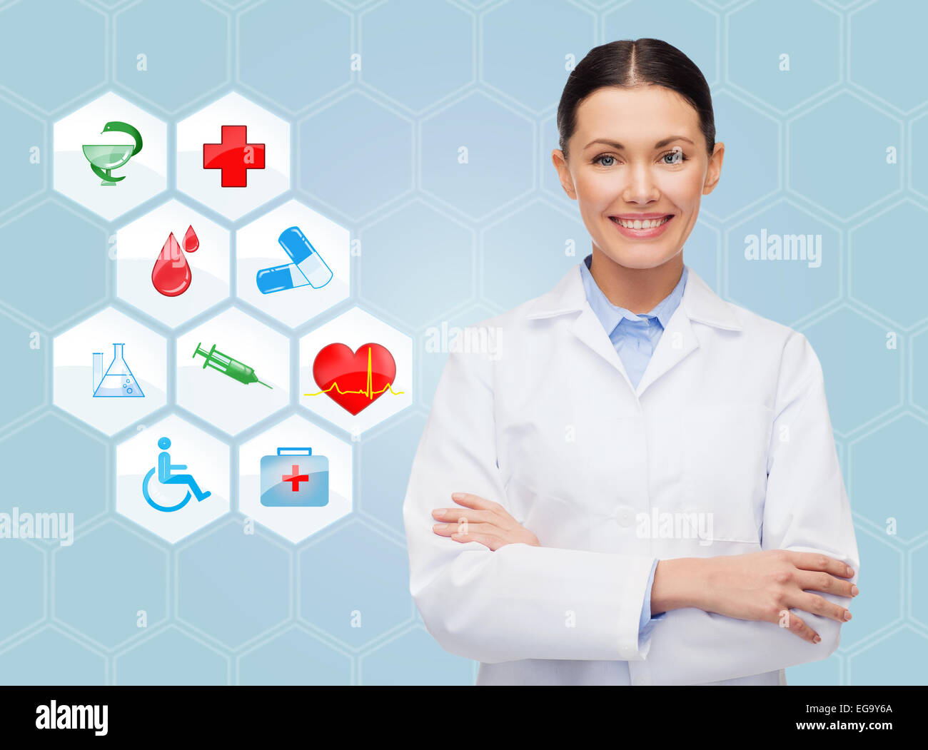 smiling doctor over medical icons blue background Stock Photo - Alamy