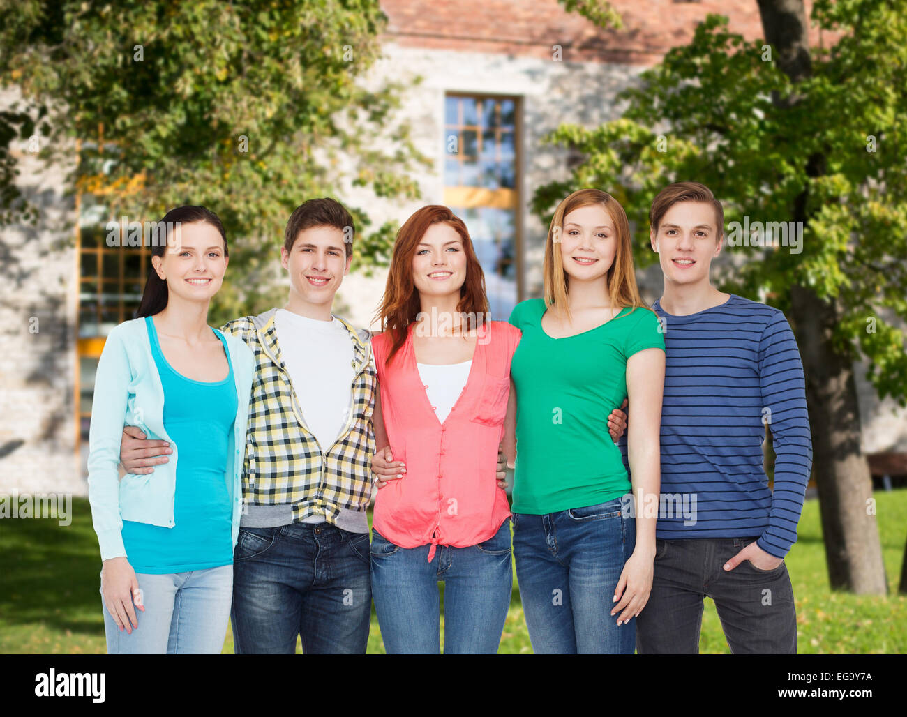 group of smiling students standing Stock Photo - Alamy