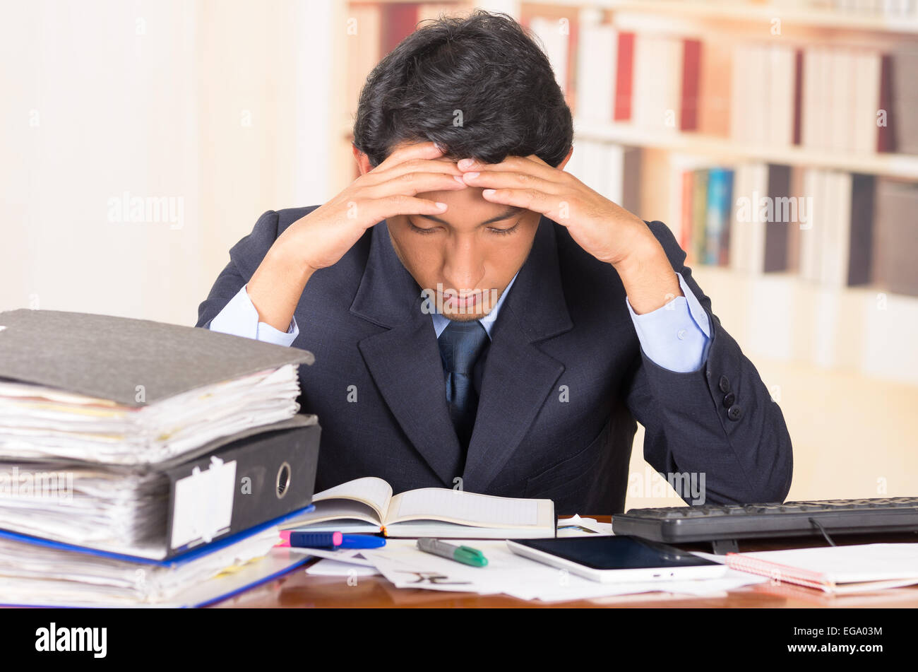 young stressed overwhelmed man with piles of folders on his desk Stock ...