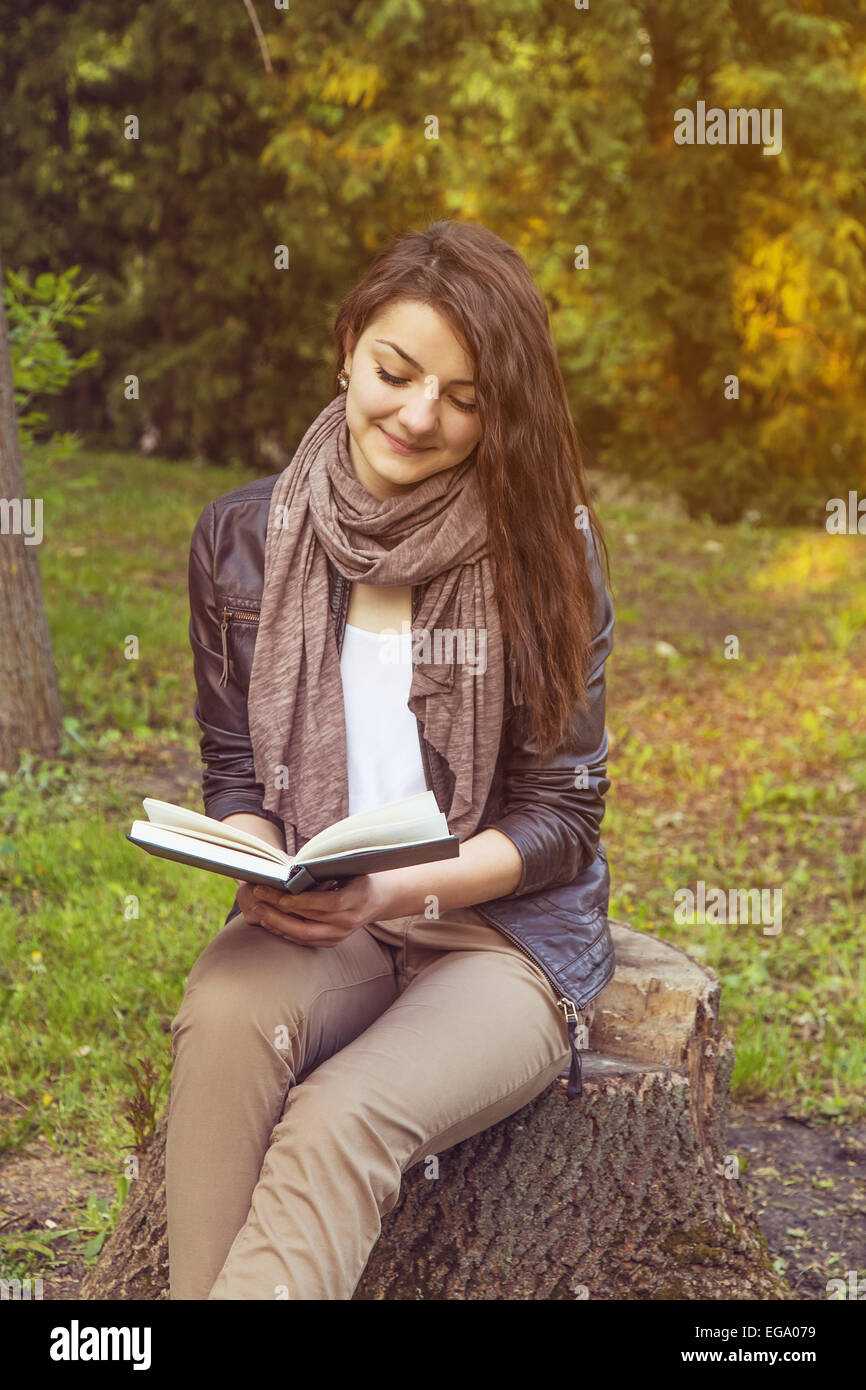 beautiful sunny portrait of a girl book Stock Photo - Alamy