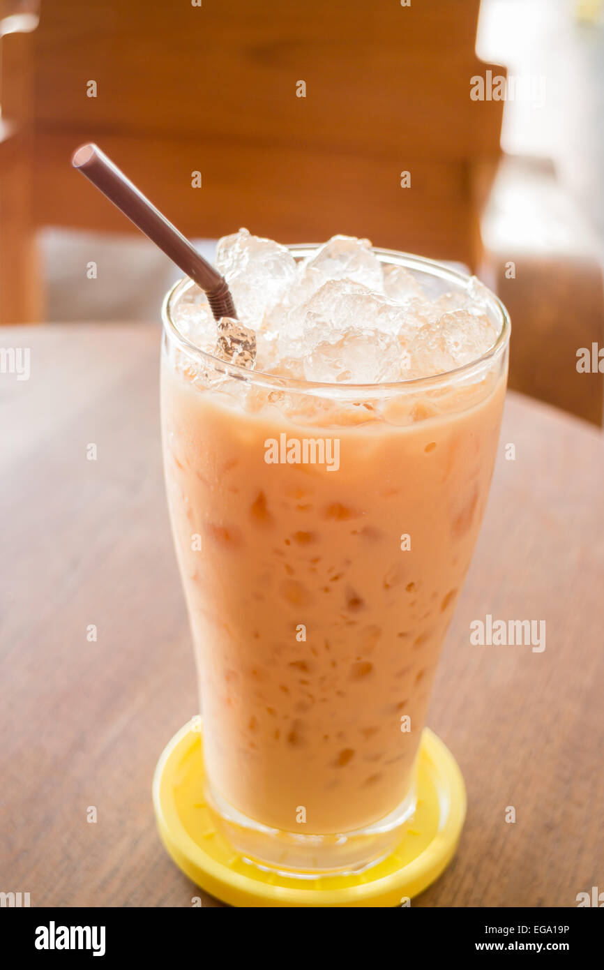 Glass of iced thai milk tea, stock photo Stock Photo - Alamy